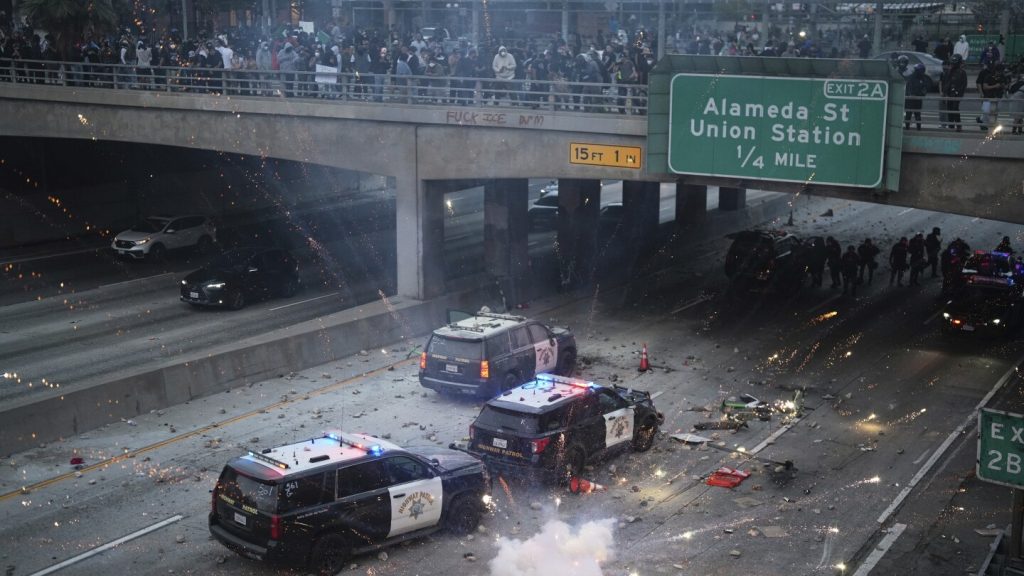 Officers hit with fireworks, cruisers pelted with rocks as L.A ...